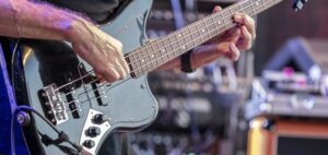Electric vs Acoustic Bass: Which One to Choose and Why? - Guitar Genix